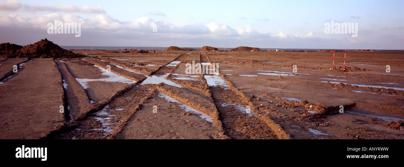 Tire track in a muddy construction area Stock Photo - Alamy