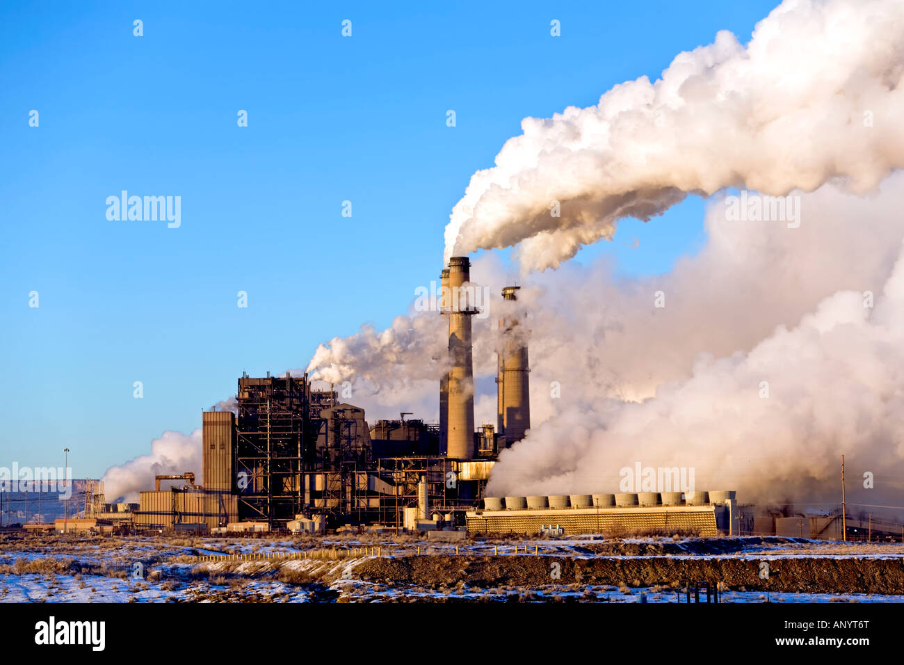 Photo close of Power plant coal burning pollution and smoke with steam ...