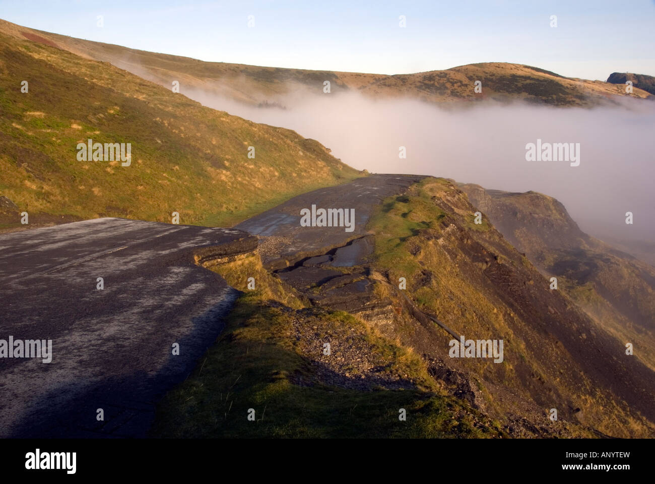 the end of the road showing structural collapse caused by landslip near ...