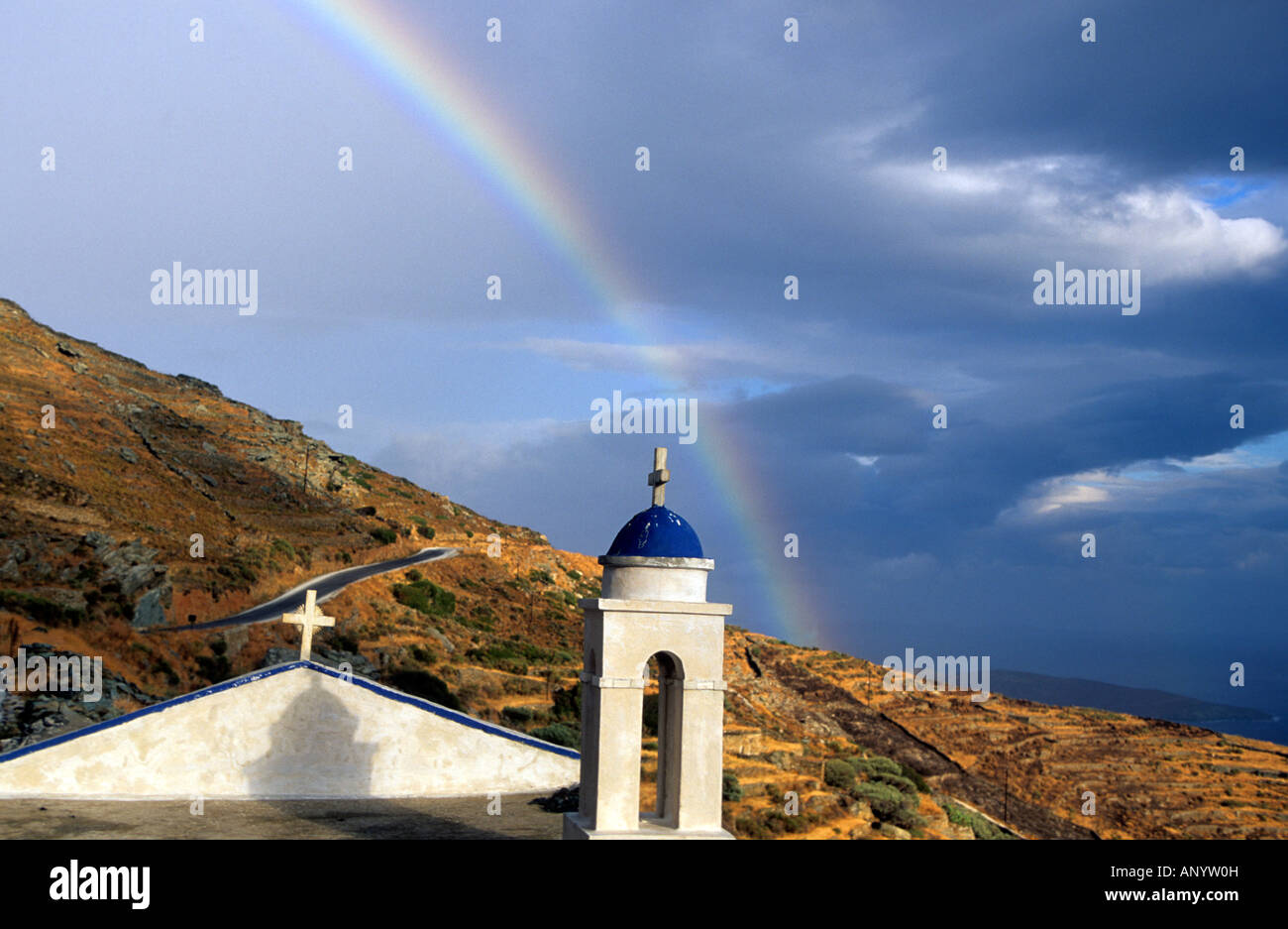 greece northern cyclades tinos a church spire with a rainbow Stock ...