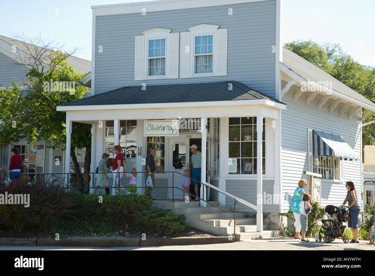 ILLINOIS Long Grove People walking on sidewalk outside retail store in ...