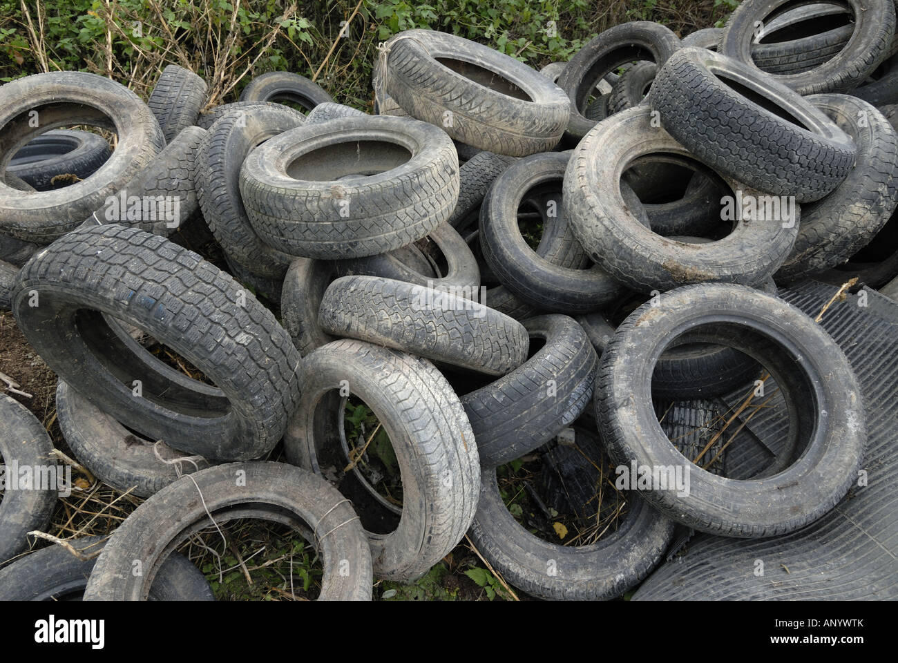 A Heap of dumped car tires Stock Photo - Alamy
