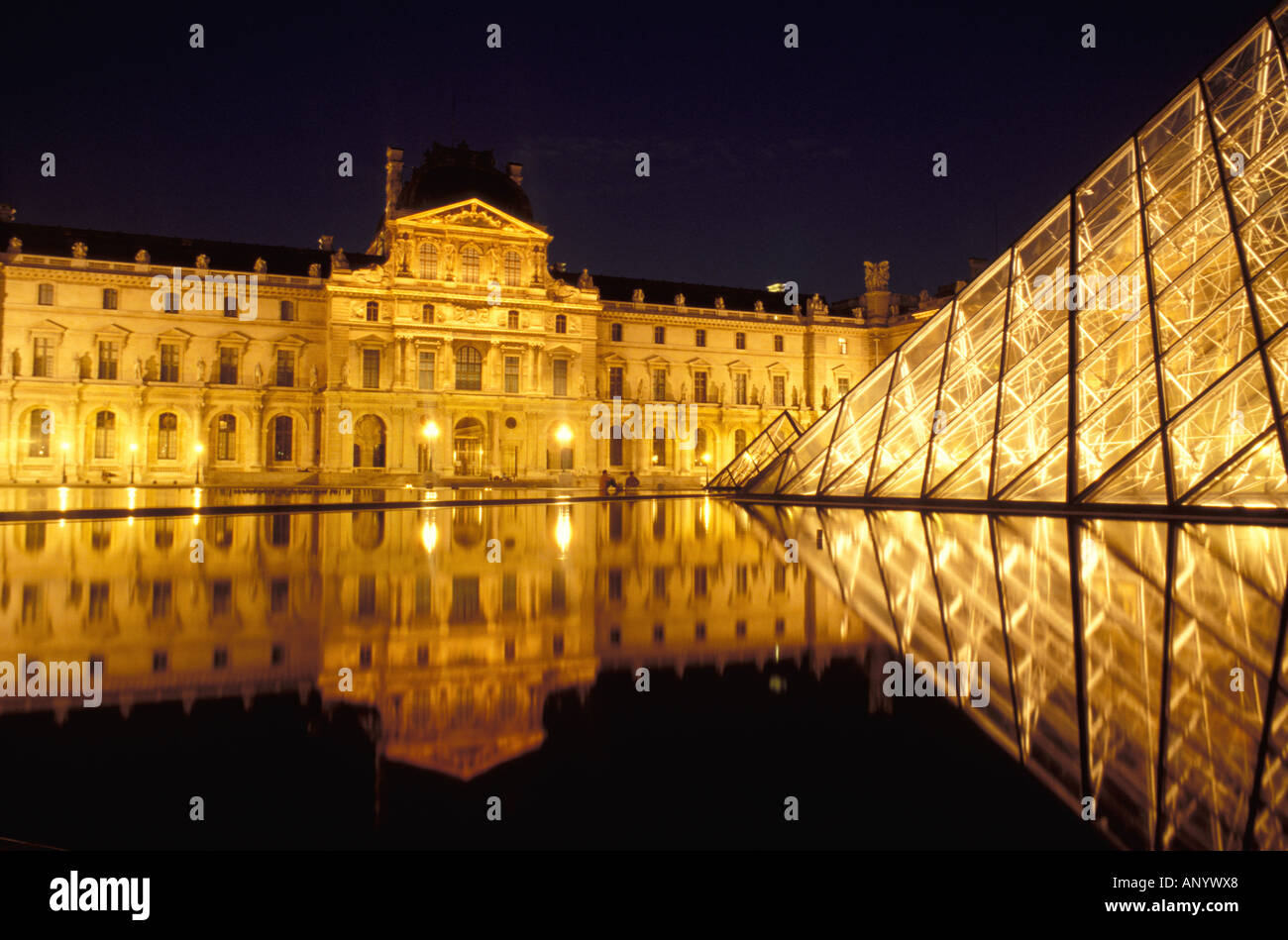 Louvre museum evening glow hi-res stock photography and images - Alamy