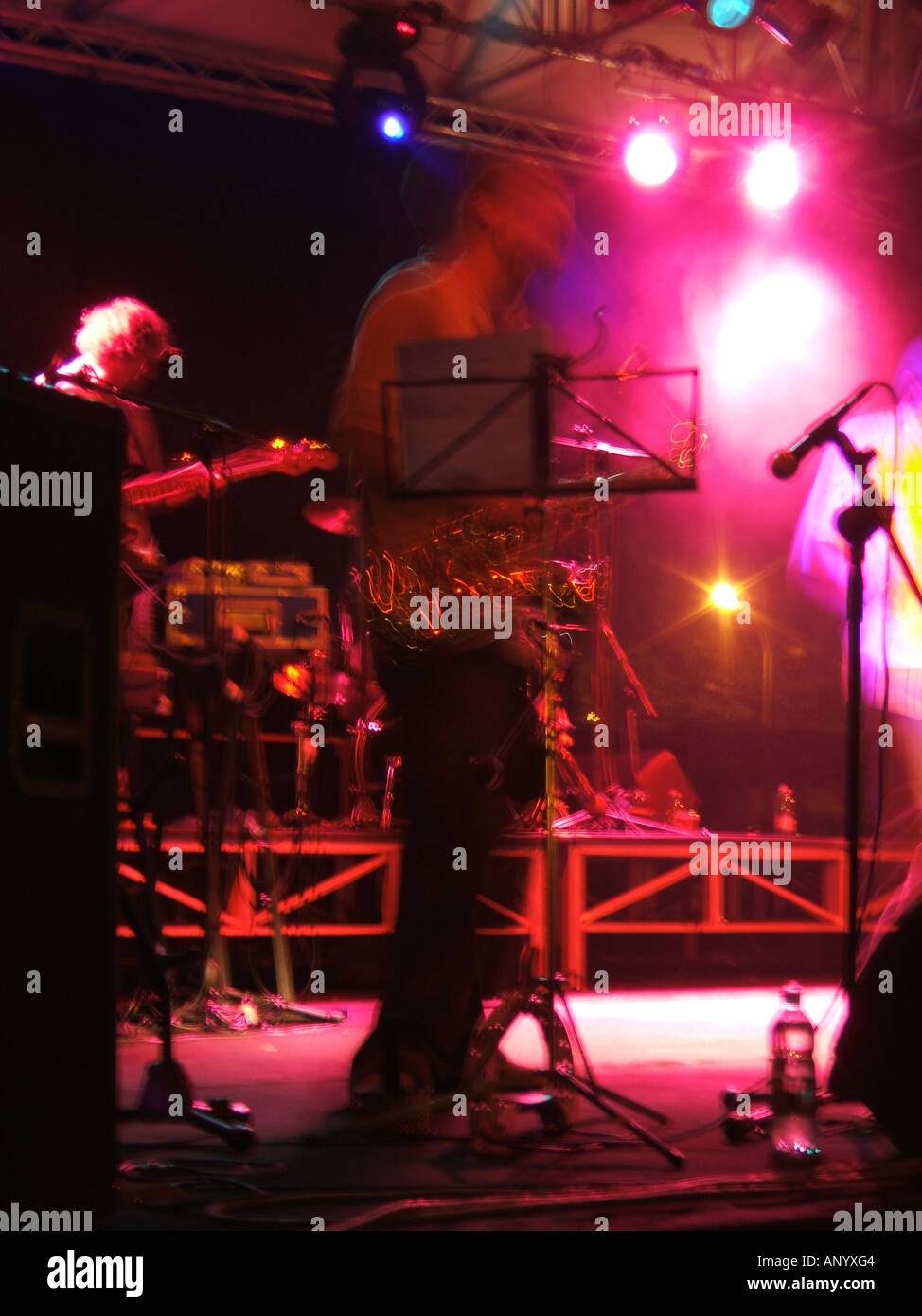 band playing in open air gig at night Stock Photo - Alamy