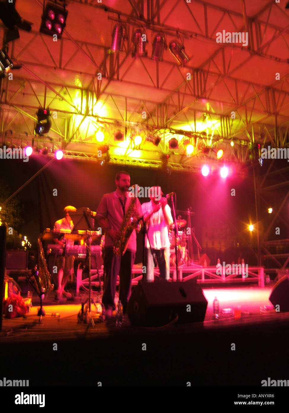 band playing in open air concert gig at night Stock Photo - Alamy