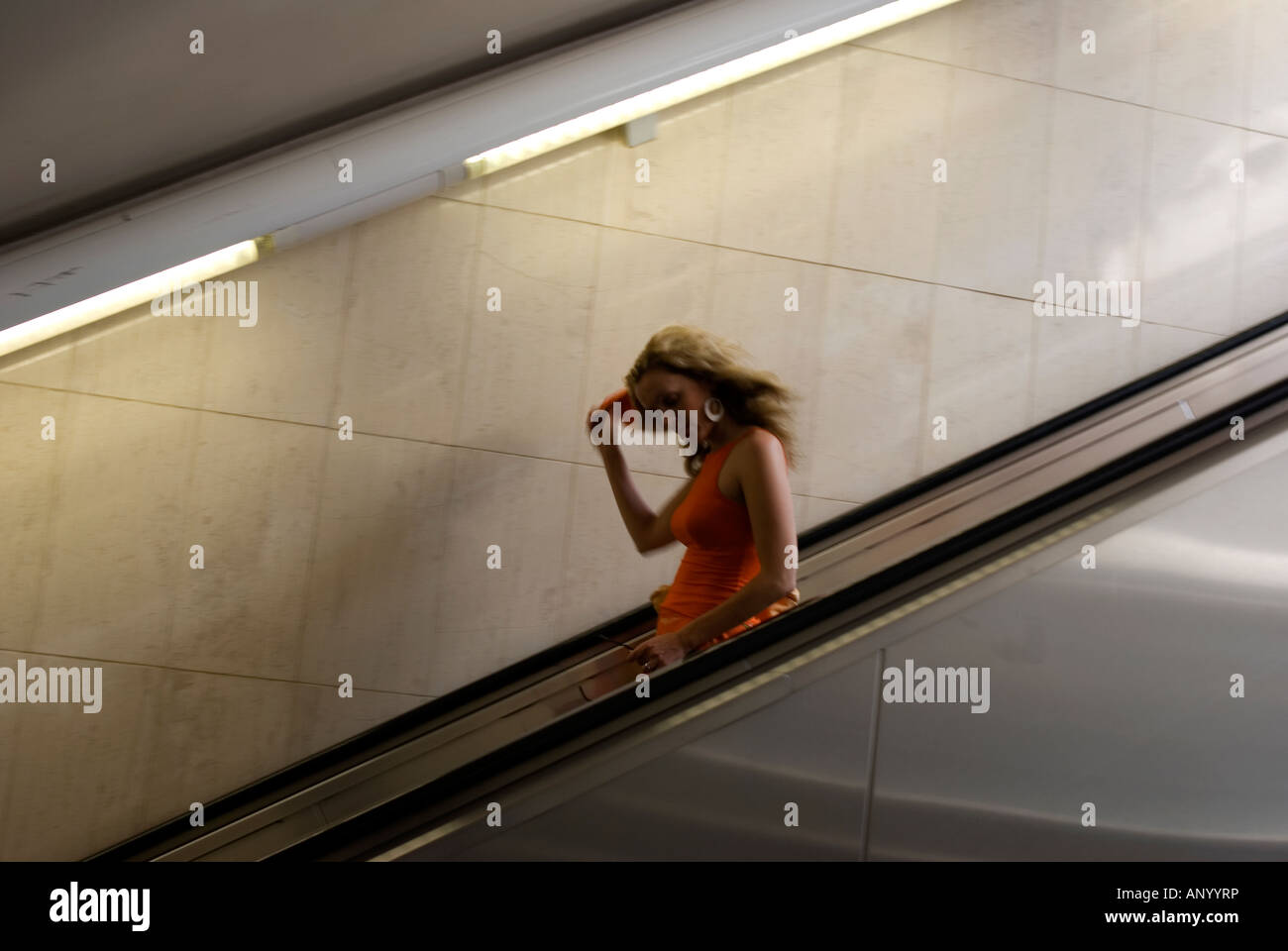 A woman in the metro Stock Photo - Alamy