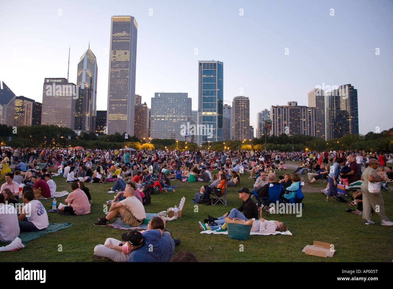 ILLINOIS Chicago Crowd of people sitting in Grant Park Petrillo outdoor ...