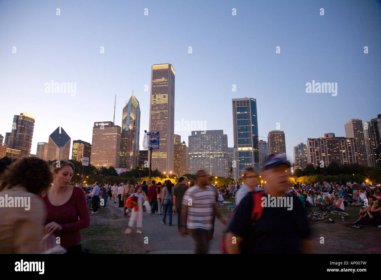 ILLINOIS Chicago Crowd of people sitting in Grant Park Petrillo outdoor ...