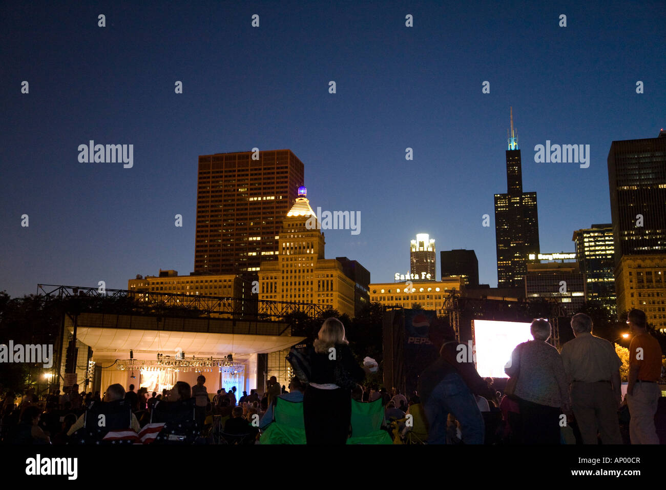 ILLINOIS Chicago Crowd of people sitting in Grant Park Petrillo outdoor ...