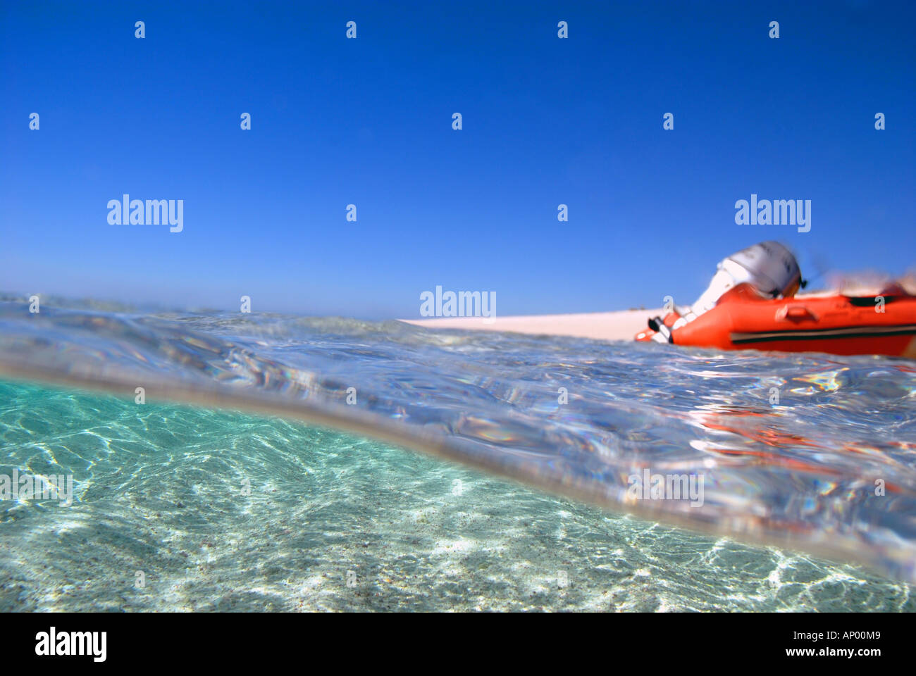 Boat on remote beach Stock Photo - Alamy