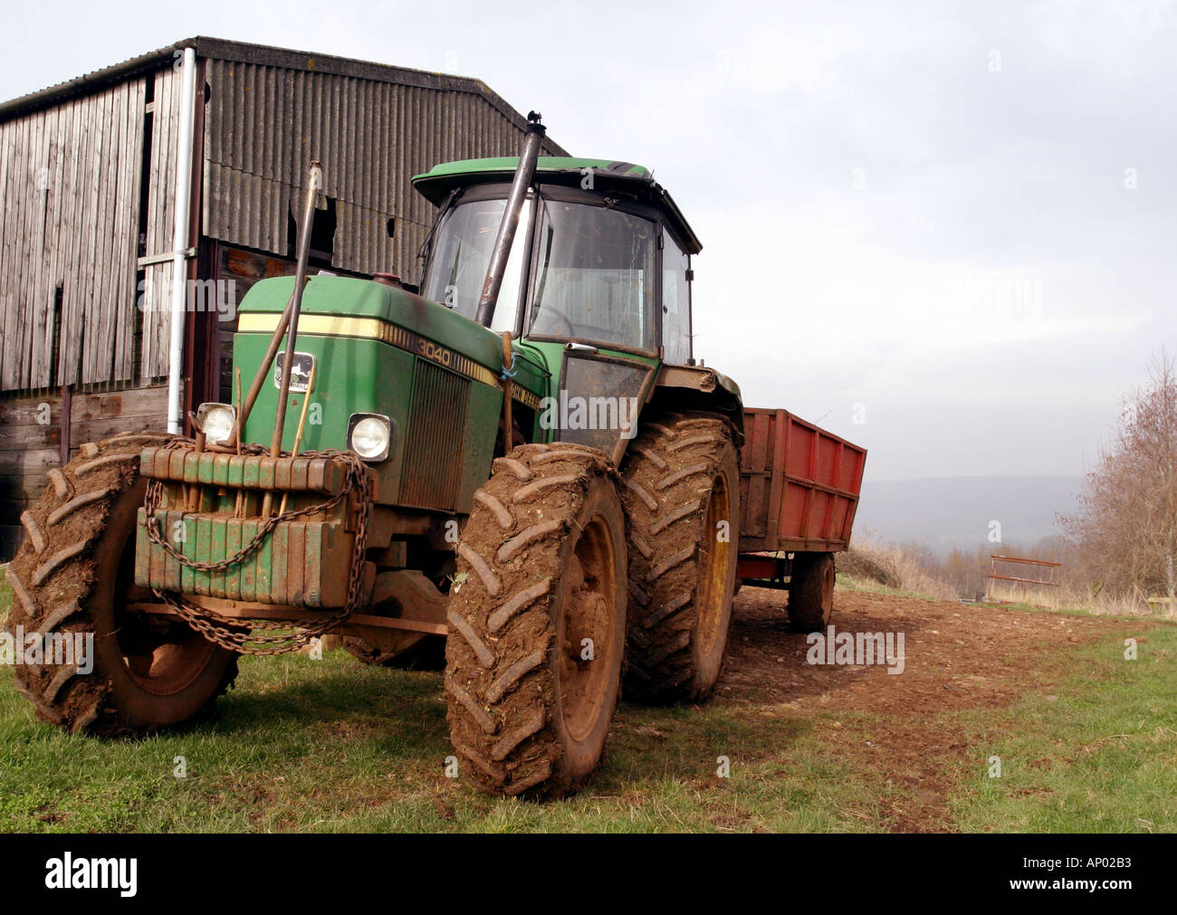 Tractor on farm in UK Stock Photo - Alamy