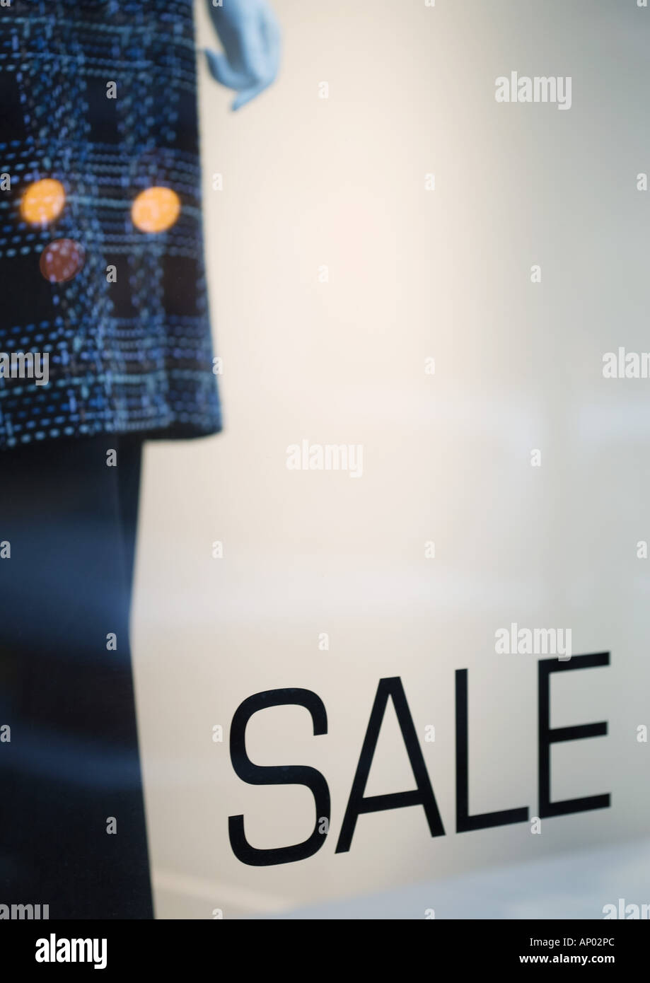 Shop window with sale sign Stock Photo - Alamy