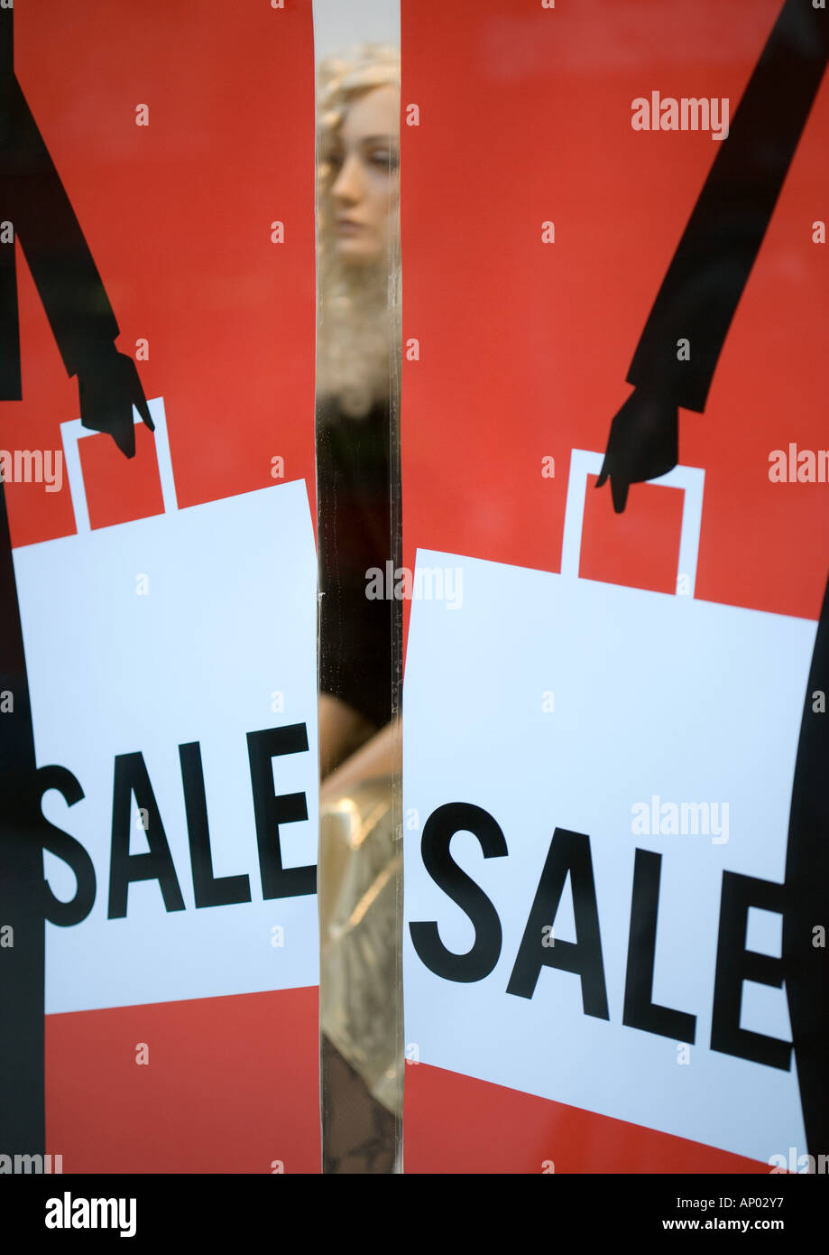 Sale sign in shop window Stock Photo - Alamy