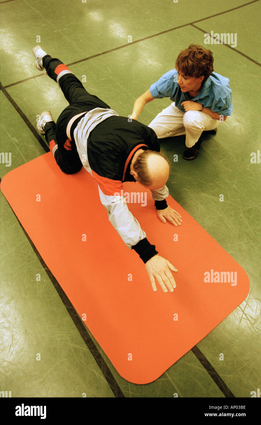 Training the back with physiotherapy after an operation Stock Photo - Alamy