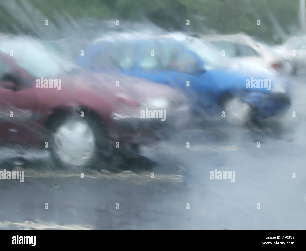 cars in wet parking lot Stock Photo - Alamy