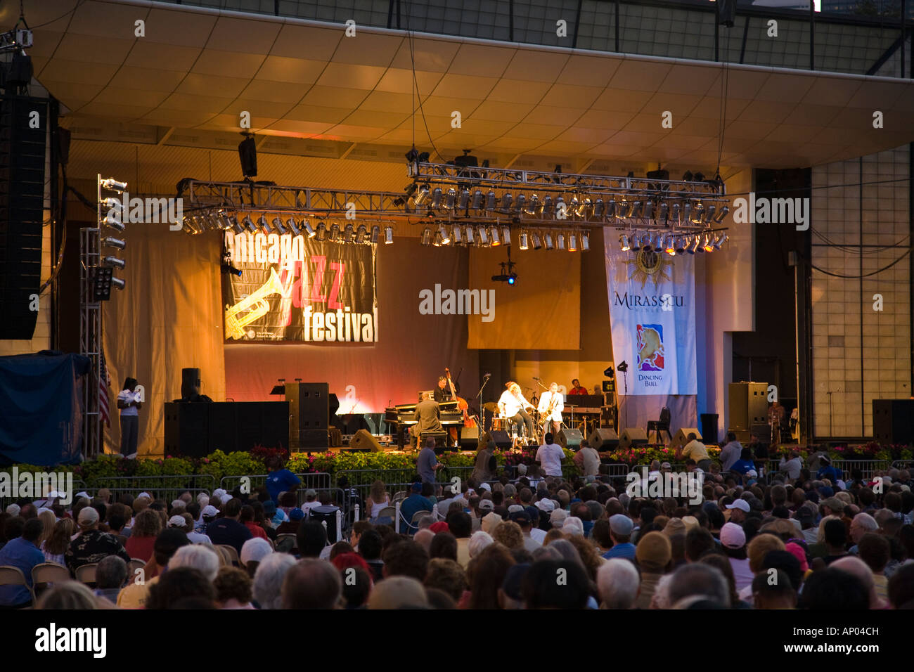 ILLINOIS Chicago Crowd of people sitting in Grant Park Petrillo outdoor ...