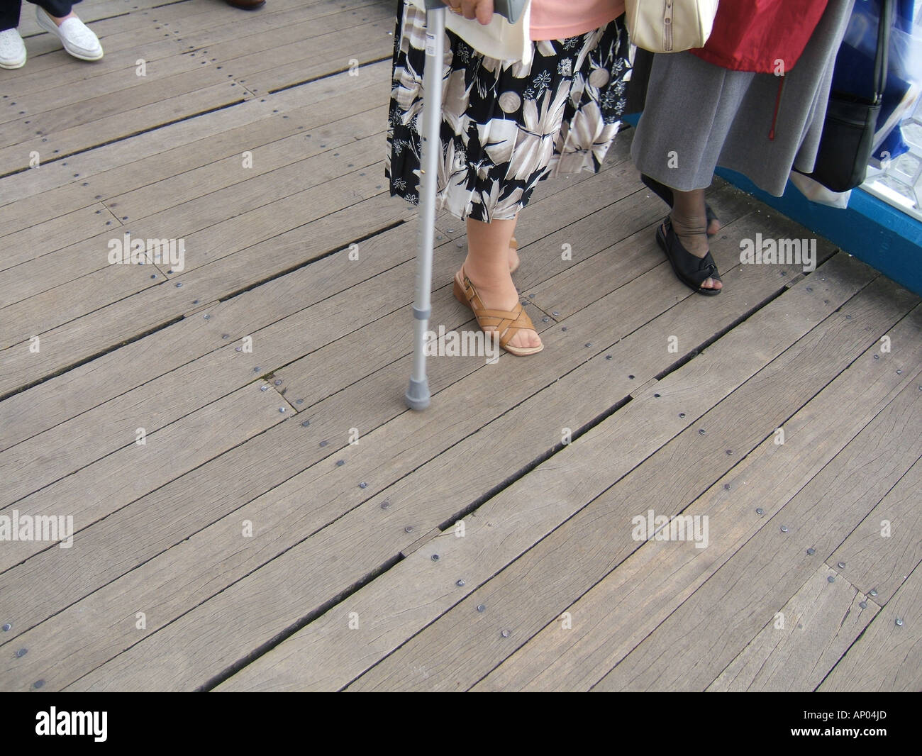 person feet legs walking in street in town Stock Photo - Alamy
