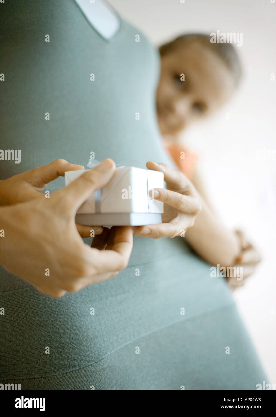Child giving mother present Stock Photo - Alamy