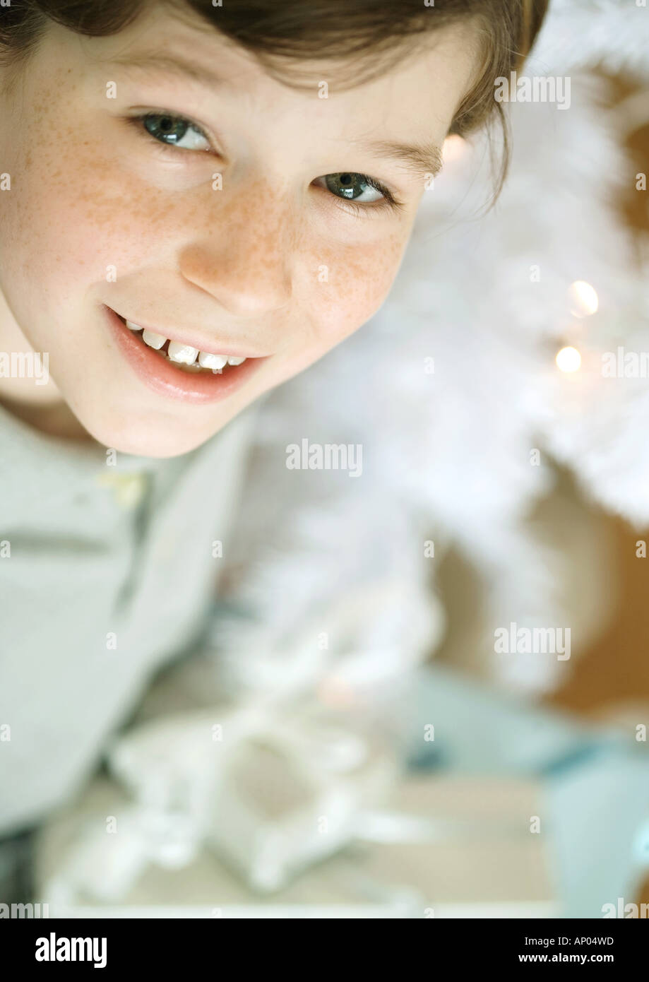 Boy smiling at camera, high angle view Stock Photo - Alamy