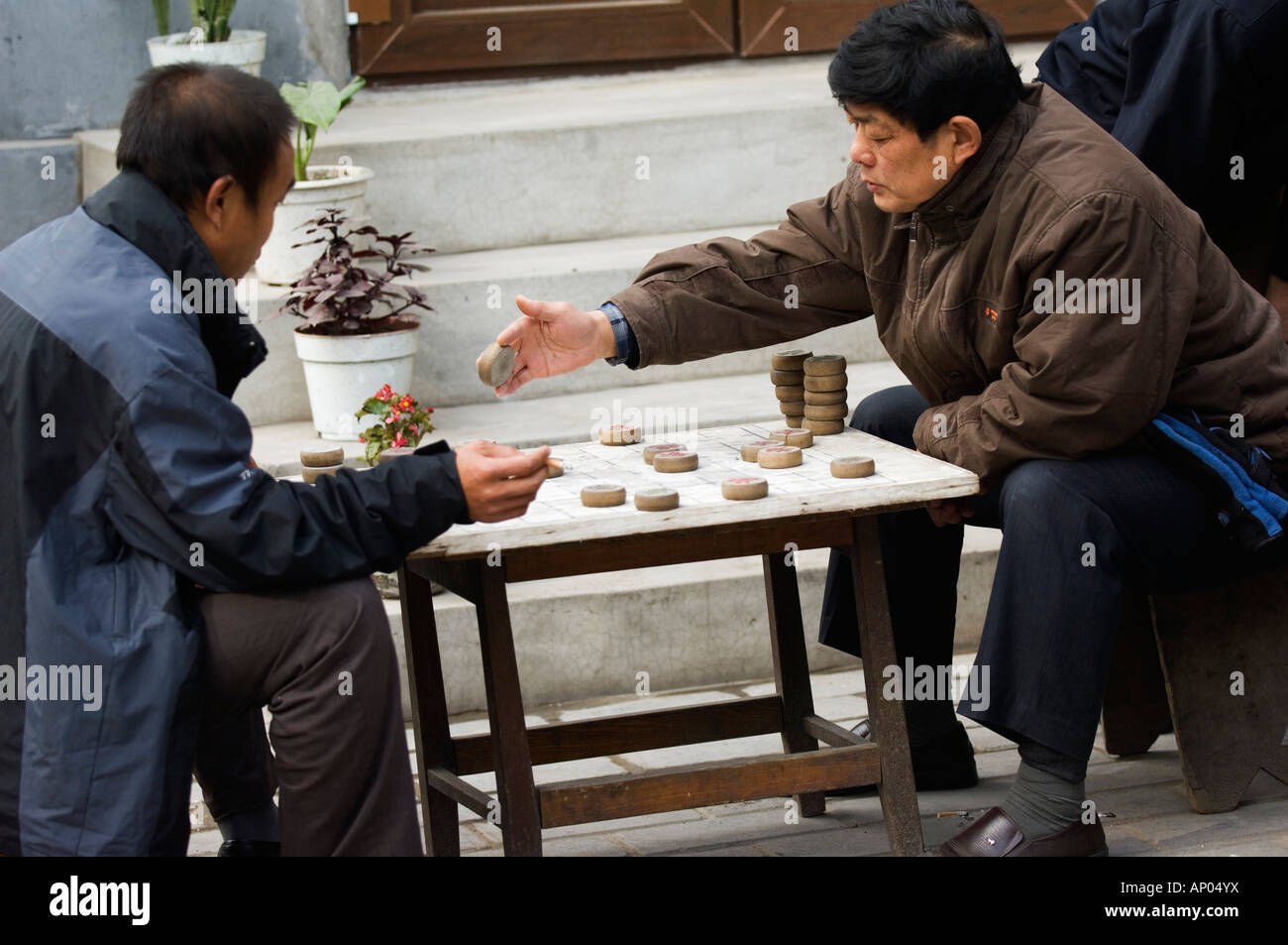 Two men playing chinese chess hi-res stock photography and images - Alamy