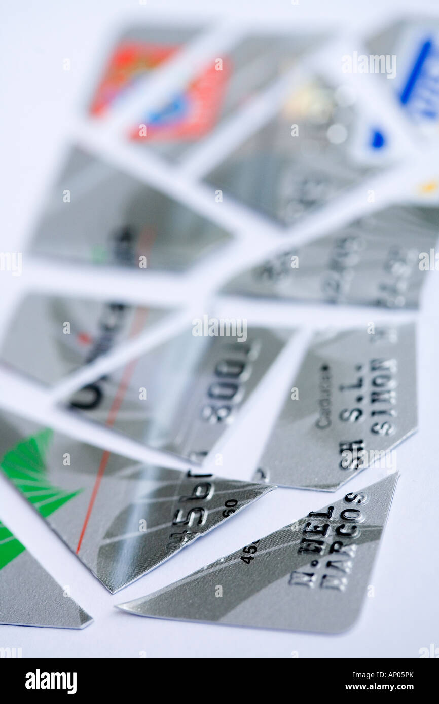 credit card cut up in pieces Stock Photo - Alamy