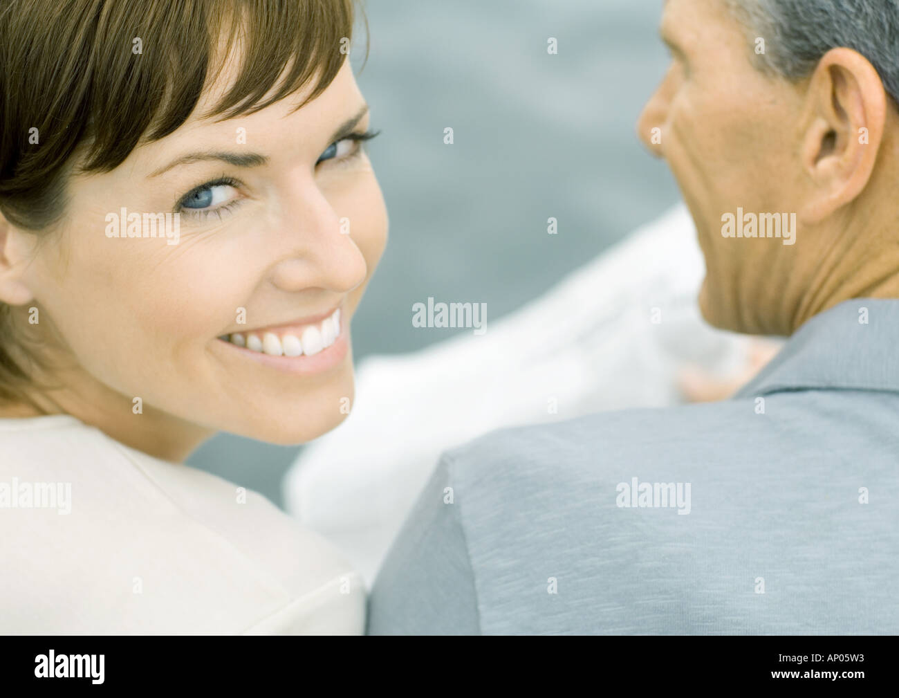 Man woman smile camera in hi-res stock photography and images - Alamy
