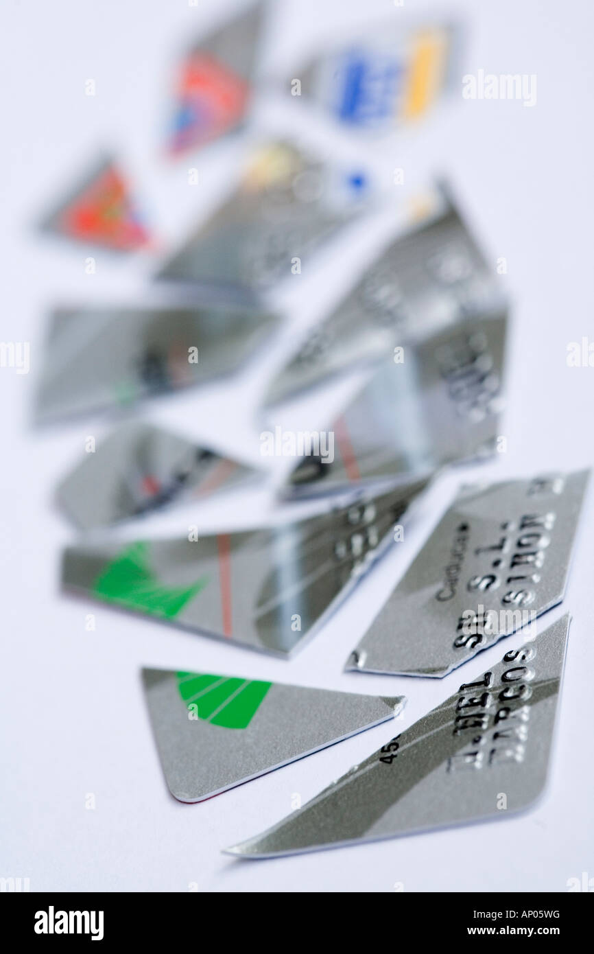 credit card cut up in pieces Stock Photo - Alamy