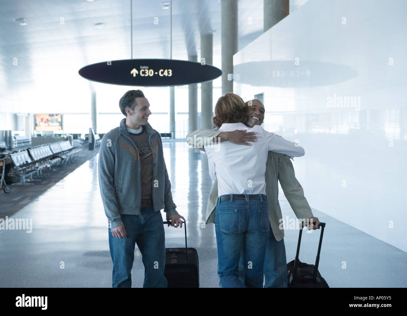 Women welcoming at airport hi-res stock photography and images - Alamy