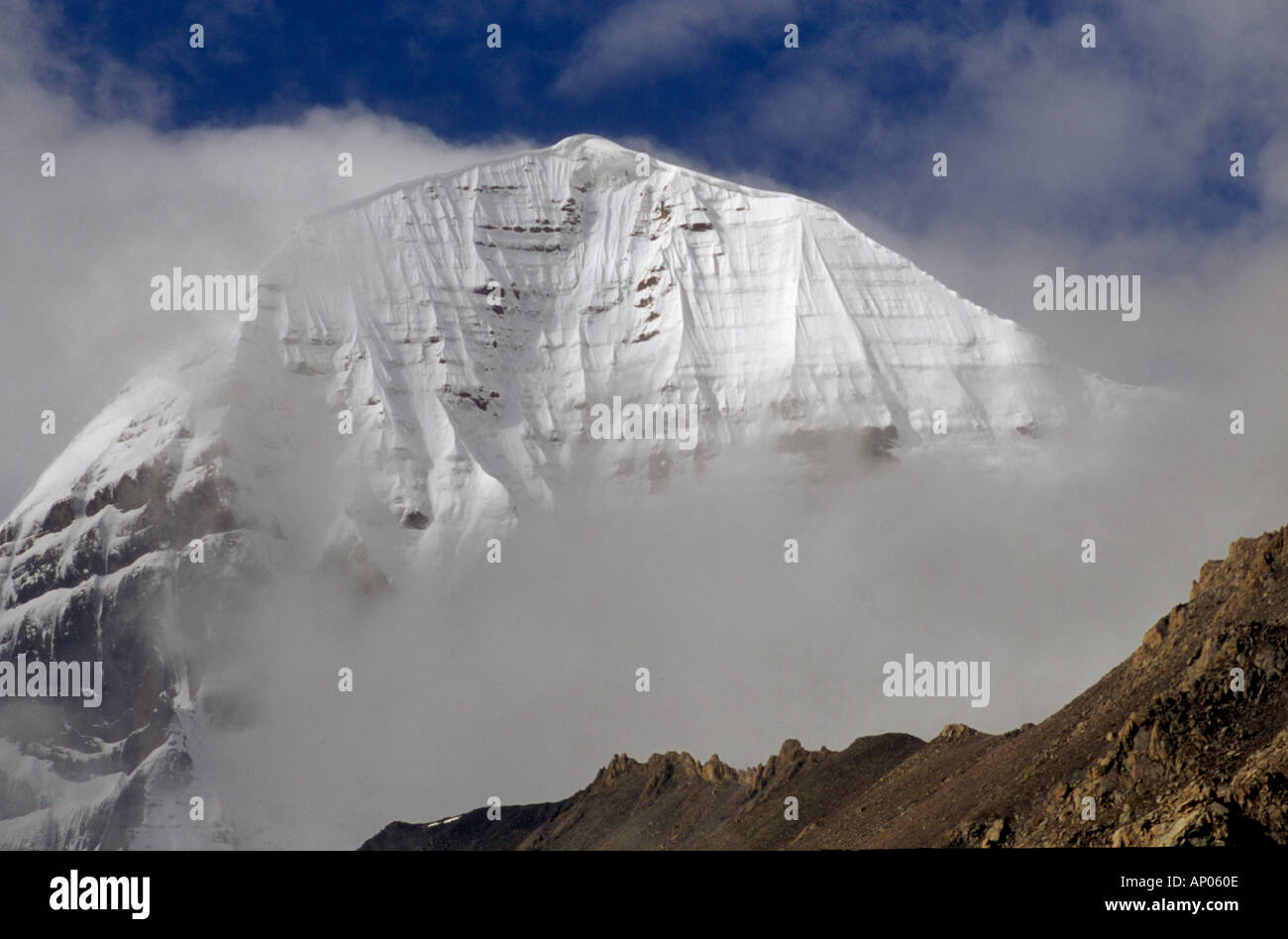 The mist enshrouded North Face of MOUNT KAILASH 6638 M is a sacred site ...