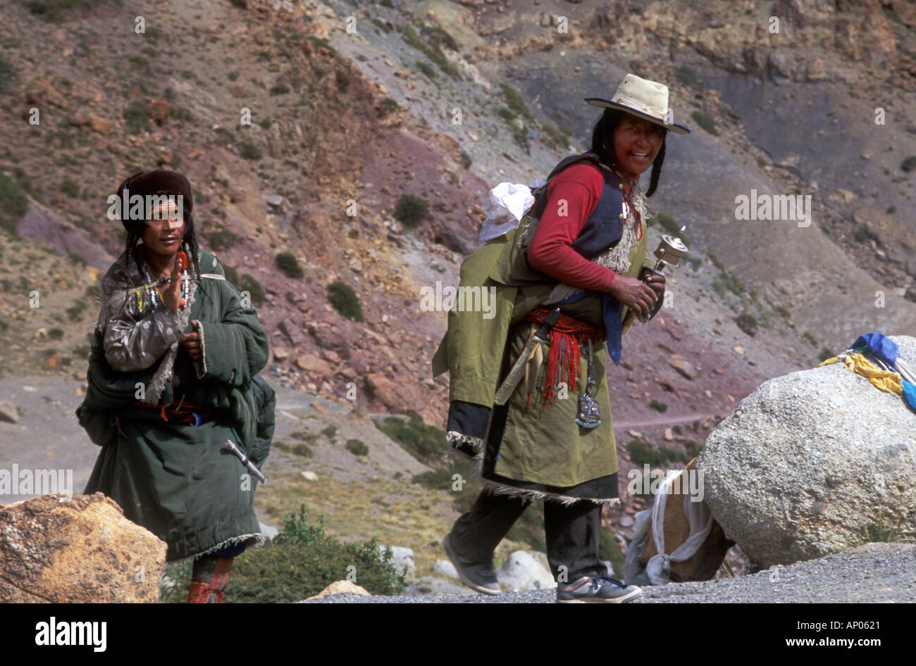 TIBETAN PILGRIMS circumnambulate MOUNT KAILASH a BUDDHIST HINDU sacred ...