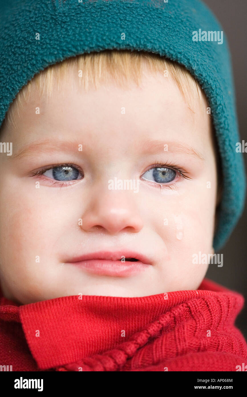 child toddler in winter cloths with tear on cheek Stock Photo - Alamy