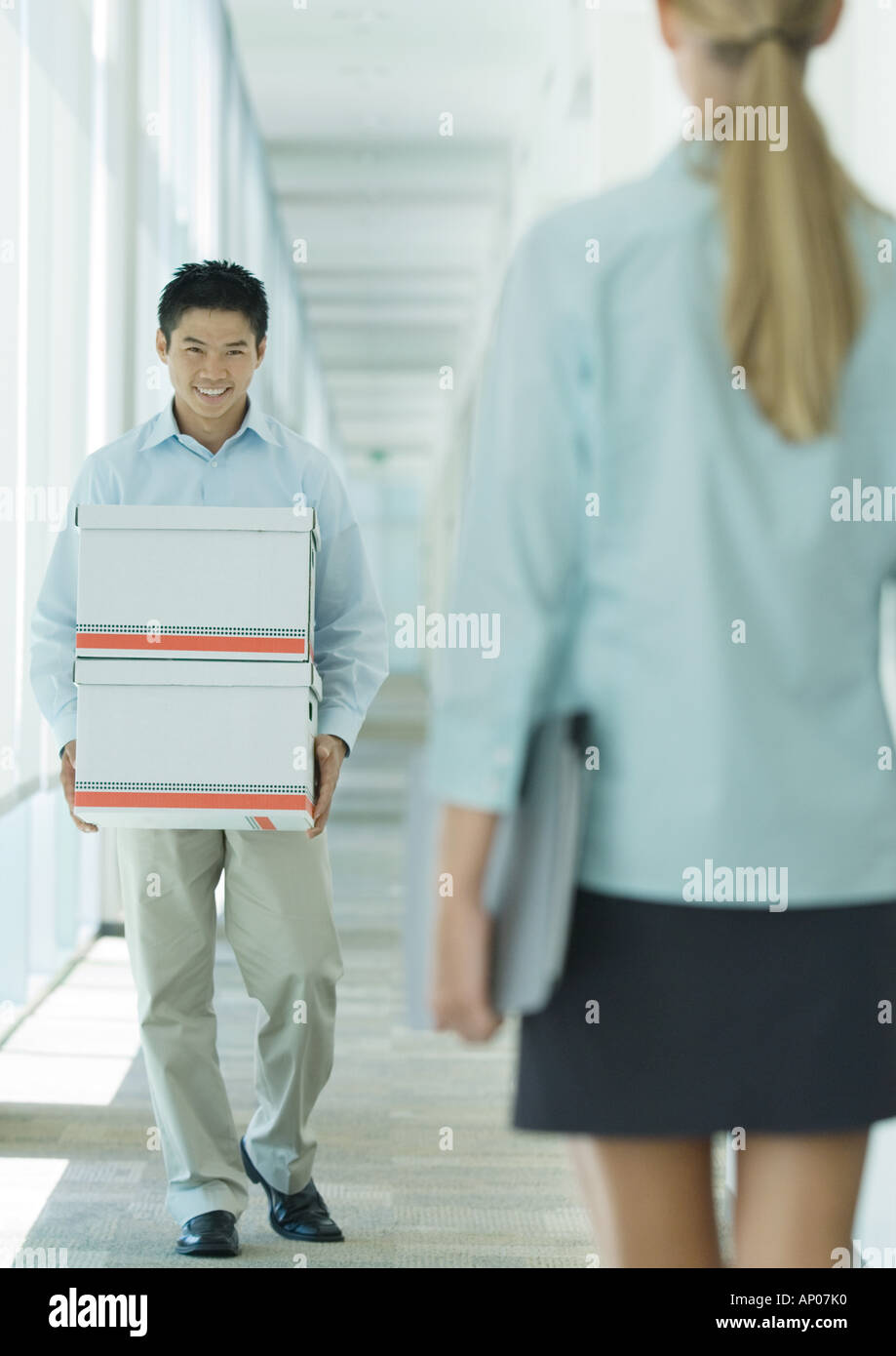Man carries cardboard boxes hi-res stock photography and images - Alamy
