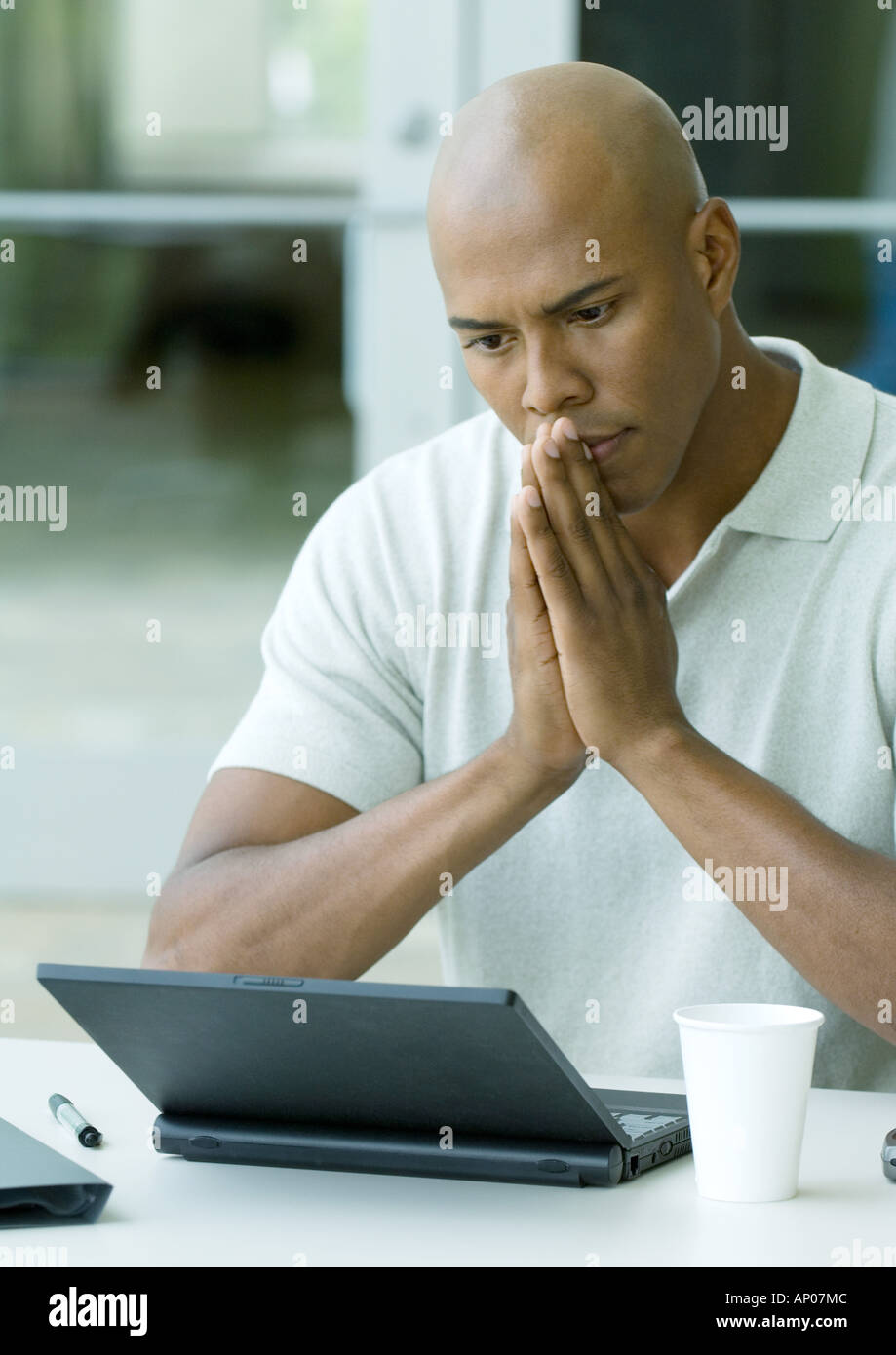 Concerned black businessman using hi-res stock photography and images - Alamy