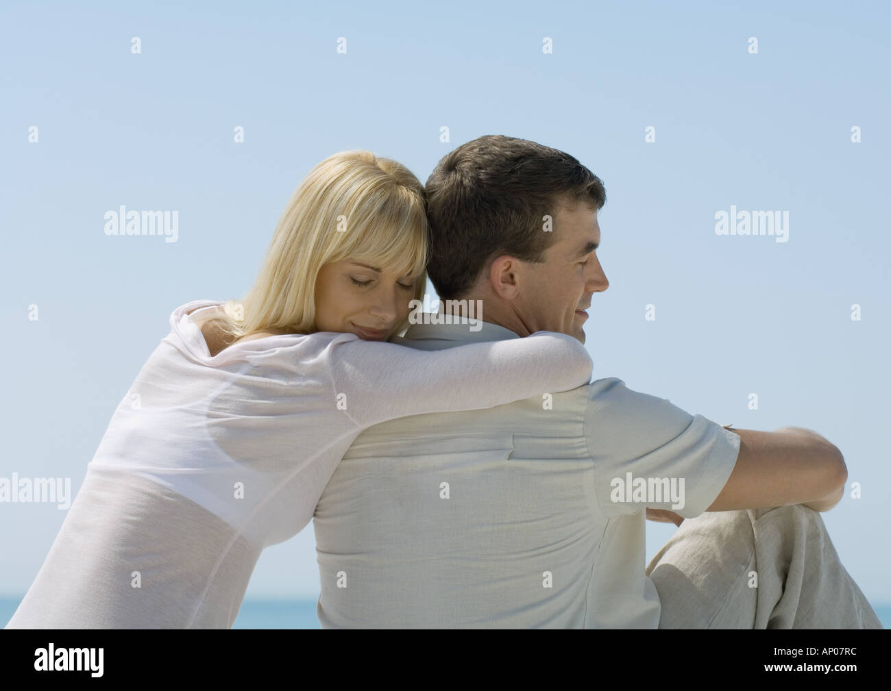 Girlfriend leaning on boyfriends shoulder hi-res stock photography and ...
