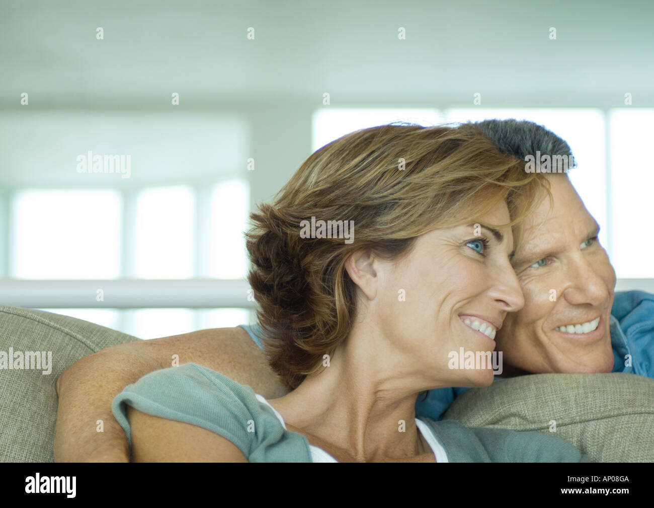 Mature couple smiling, cheek to cheek Stock Photo - Alamy