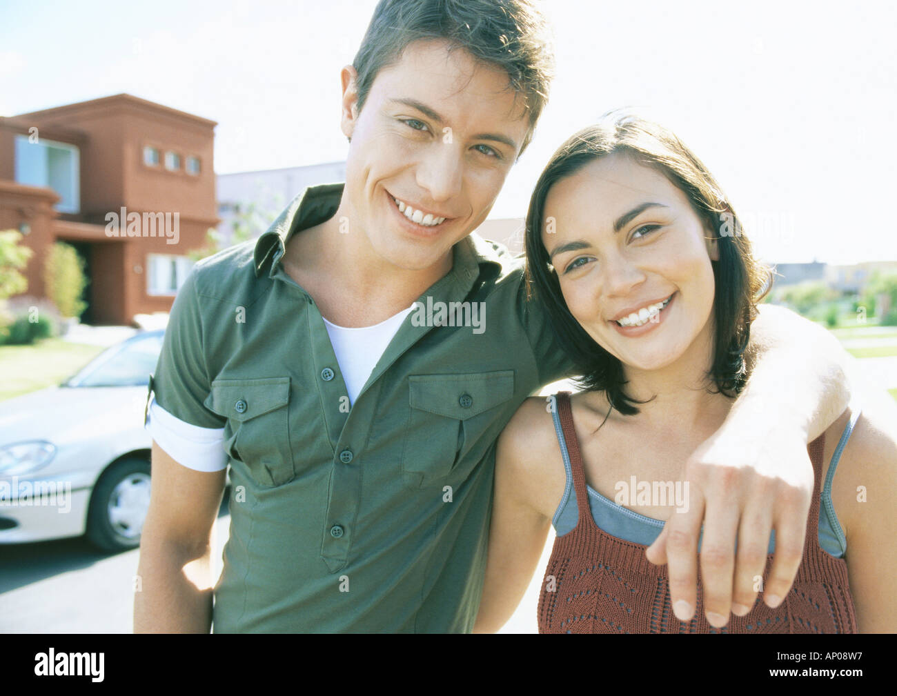 Couples standing in front of their houses hi-res stock photography and ...