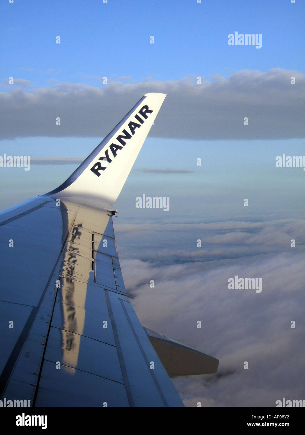 wing of ryanair plane in morning sun Stock Photo - Alamy