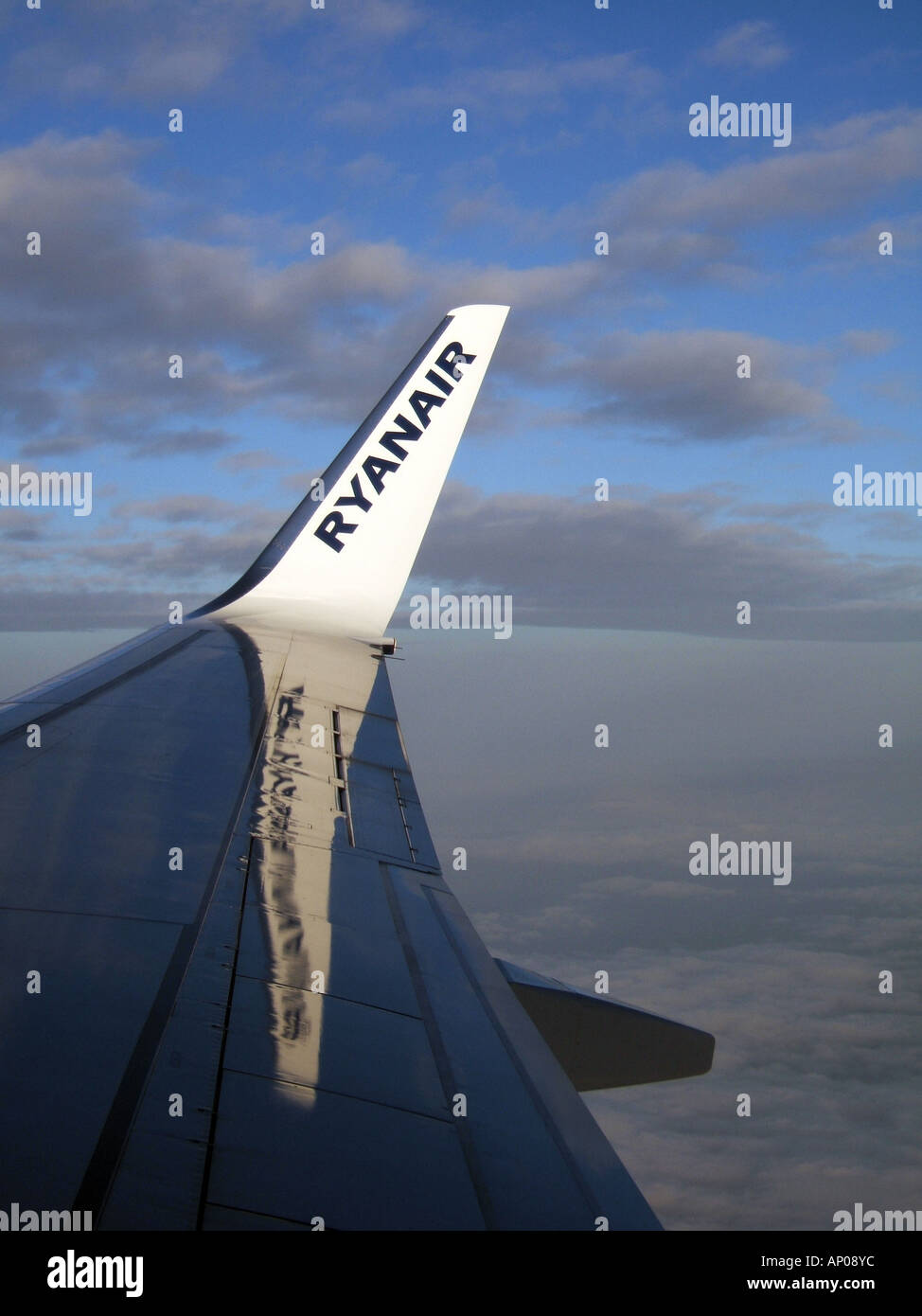 wing of ryanair plane in morning sun Stock Photo - Alamy