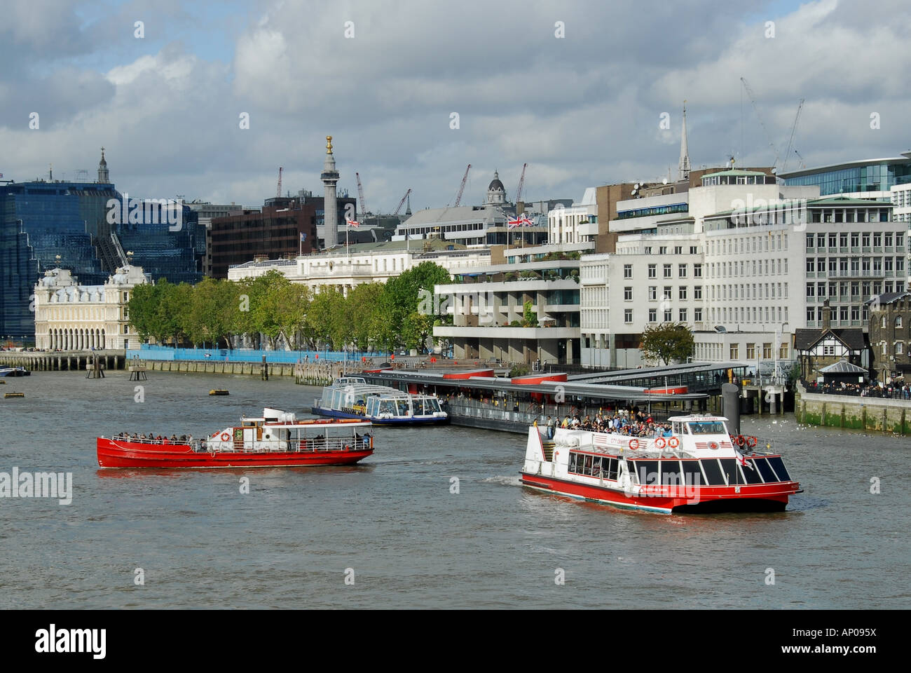 The river thames and tower pier in London as viewed from tower bridge ...