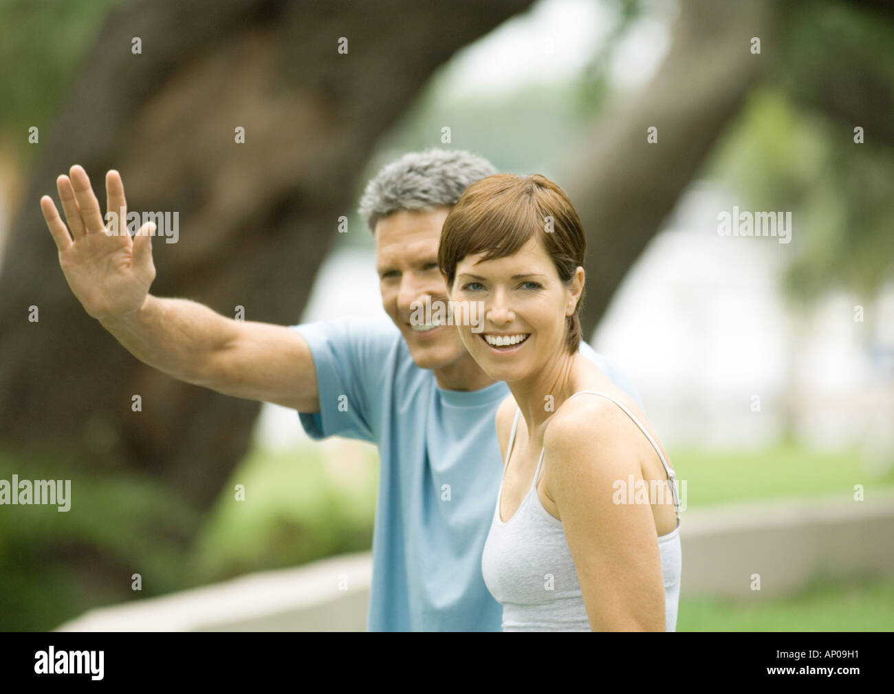 Two men waving hands hi-res stock photography and images - Alamy
