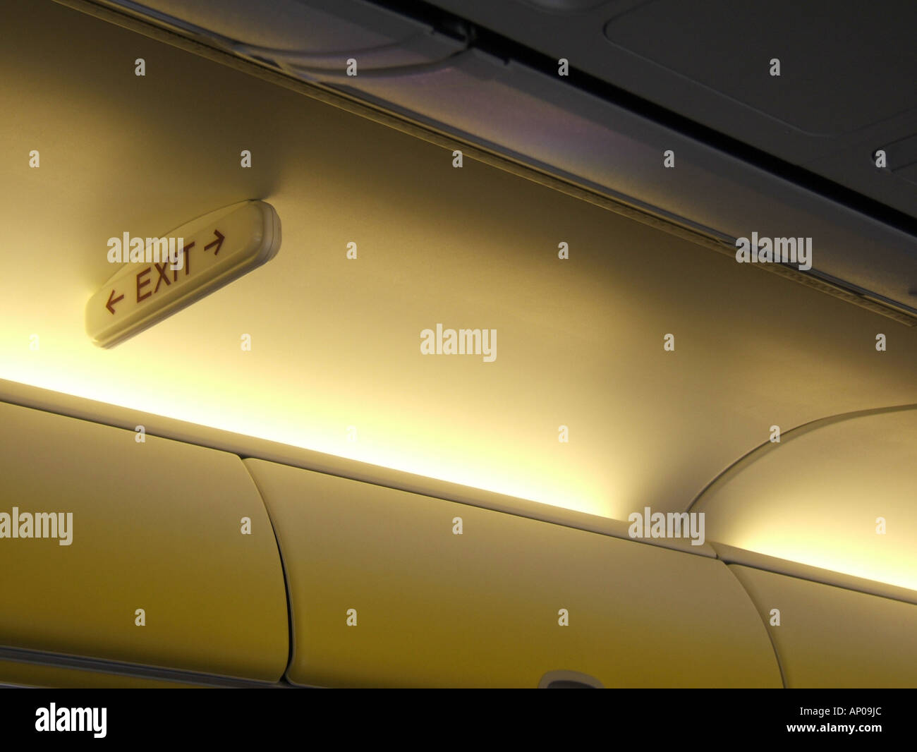 Airplane cabin interior exit sign hi-res stock photography and images ...