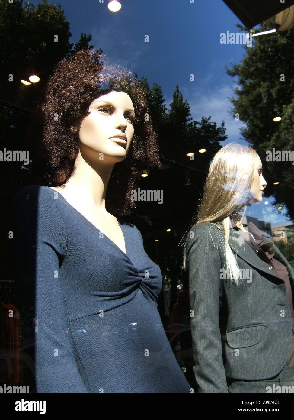 mannequins in shop window Stock Photo - Alamy