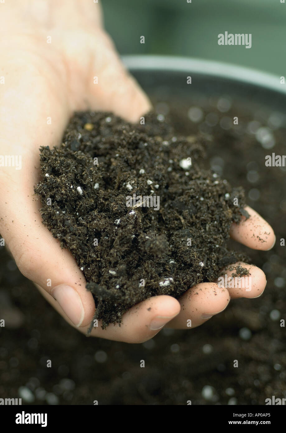 Handful of soil Stock Photo - Alamy