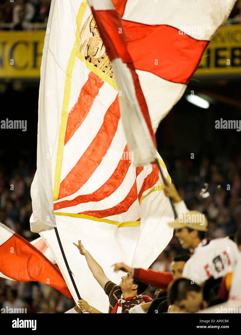 Sevilla FC fans waving flags Stock Photo - Alamy