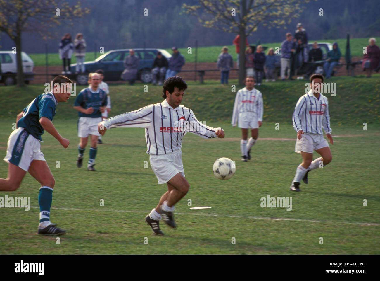 Europe, Germany. Adults playing soccer Stock Photo - Alamy