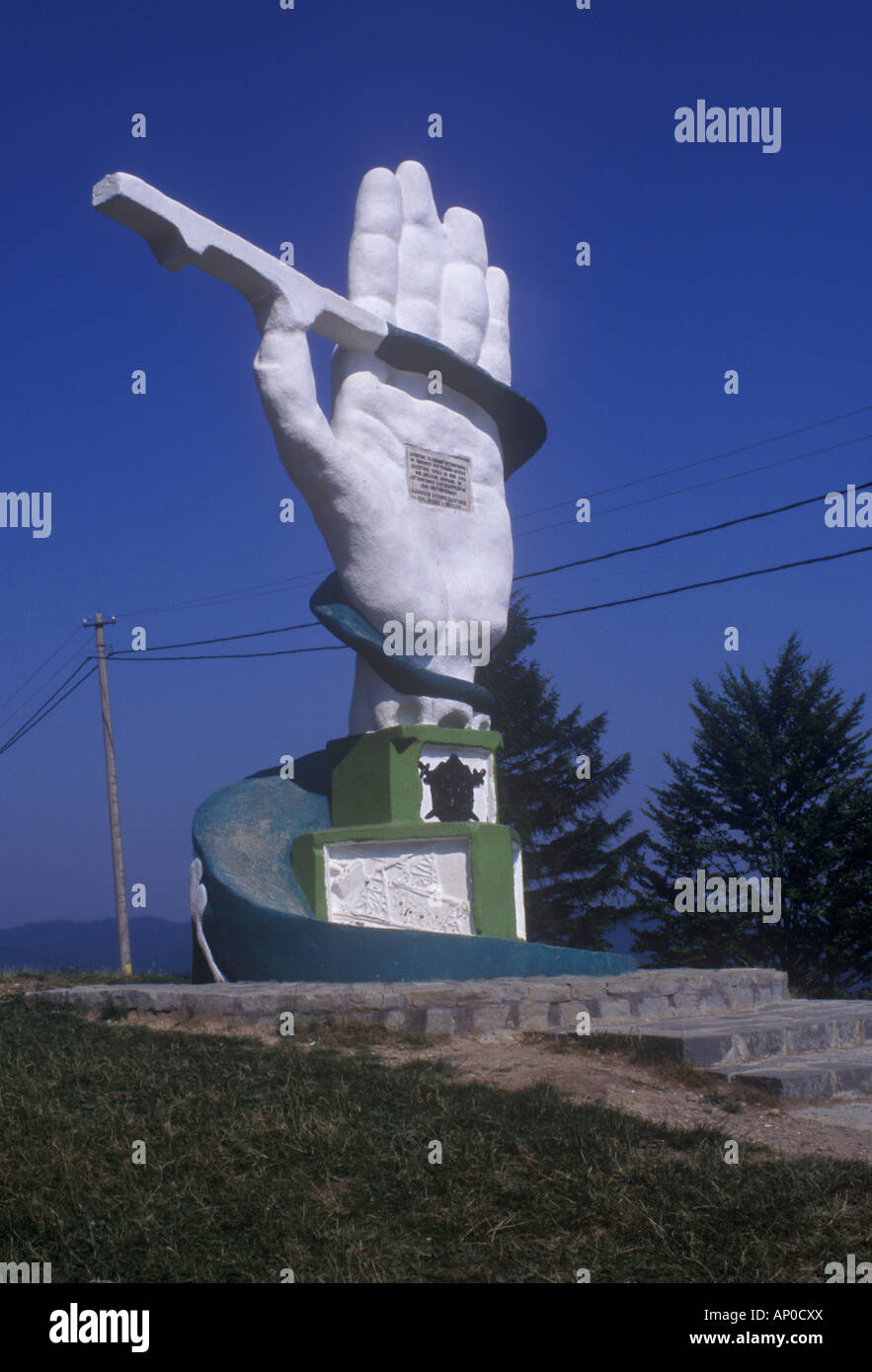 Monument of giant hand holding model road hi-res stock photography and ...