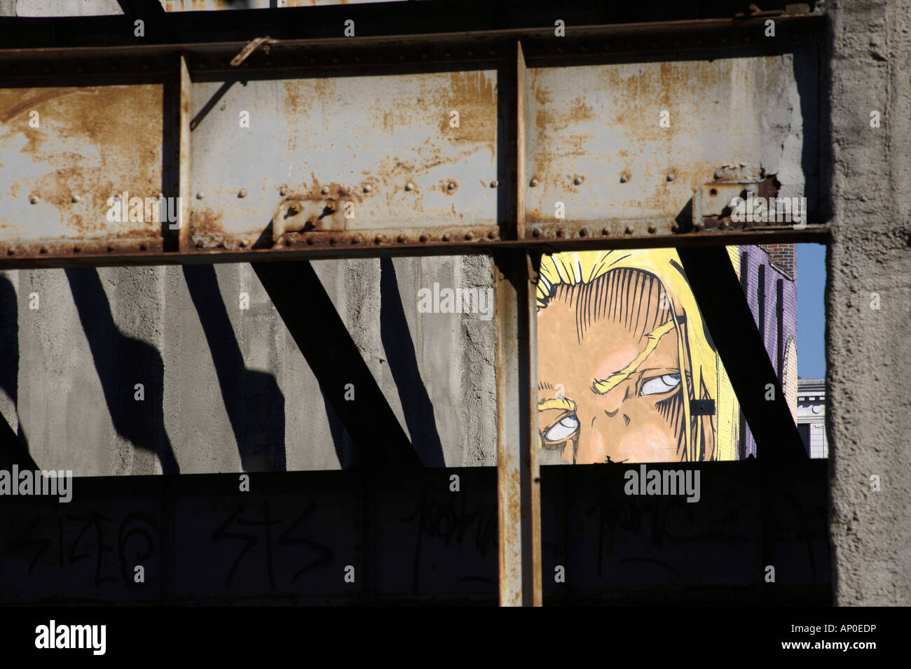 Graffiti of face peeking through girders. Catherine Street, Montreal ...