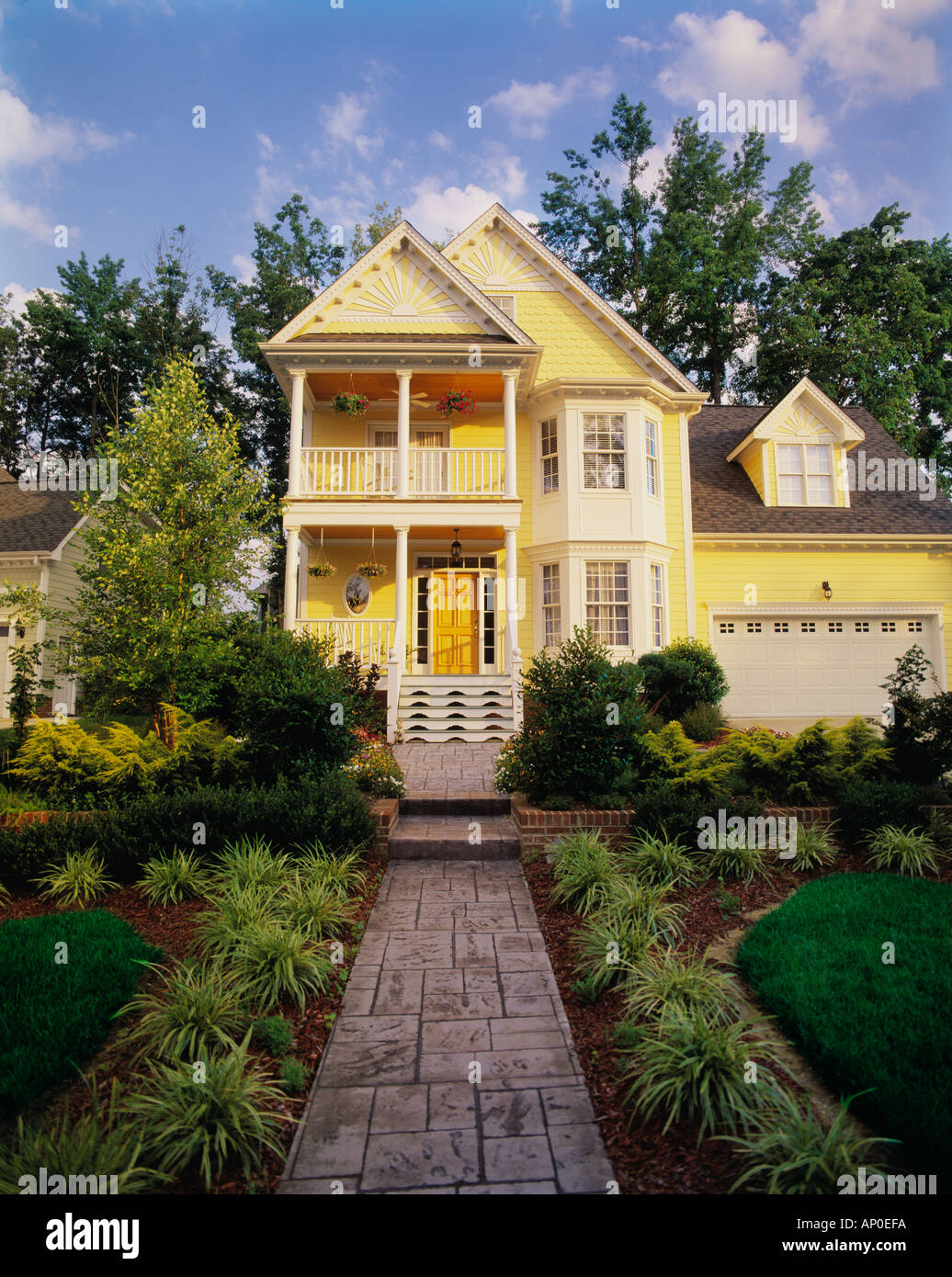 Large two story yellow house hi-res stock photography and images - Alamy