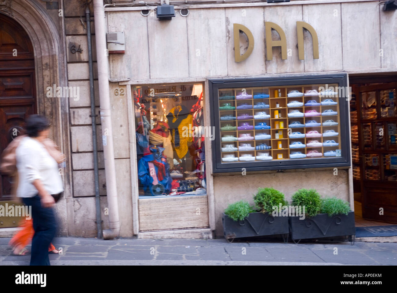 Window shoppers in Rome, Italy Stock Photo - Alamy