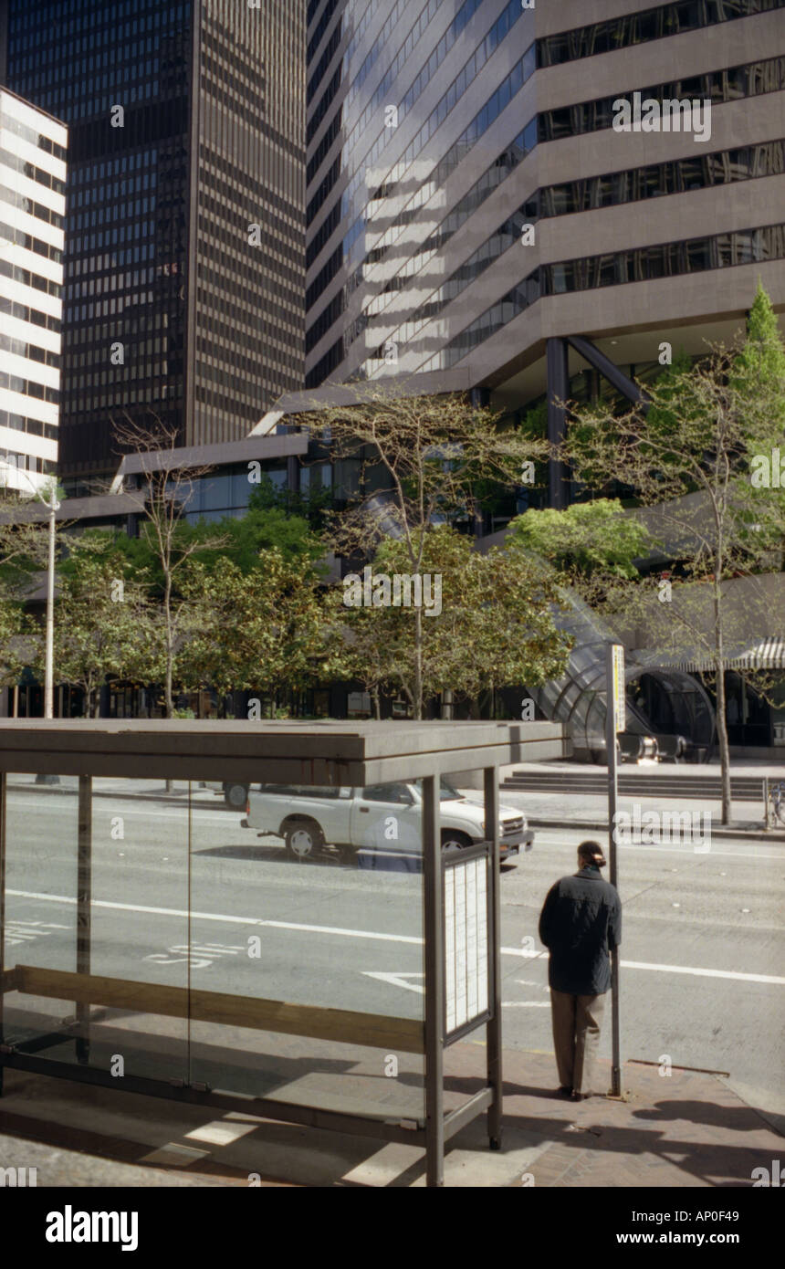 man waiting at bus stop Seattle Wa Stock Photo - Alamy